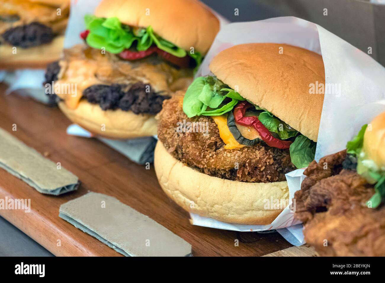 Row of burgers hi-res stock photography and images - Alamy