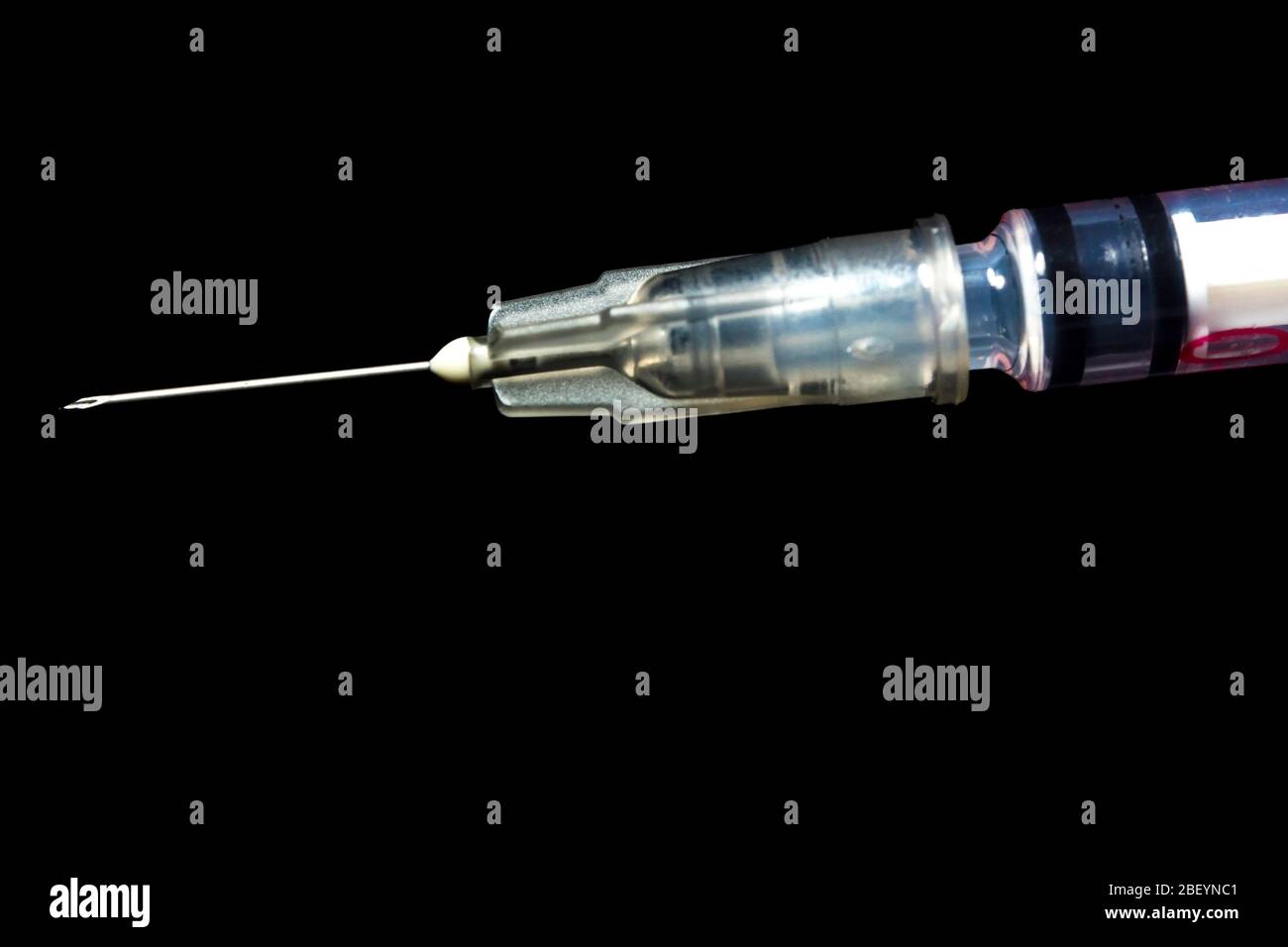 Sharp needle of syringe, injection on black background Stock Photo - Alamy