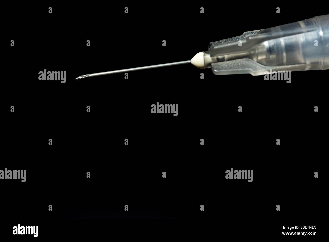 Sharp needle of syringe, injection on black background Stock Photo - Alamy