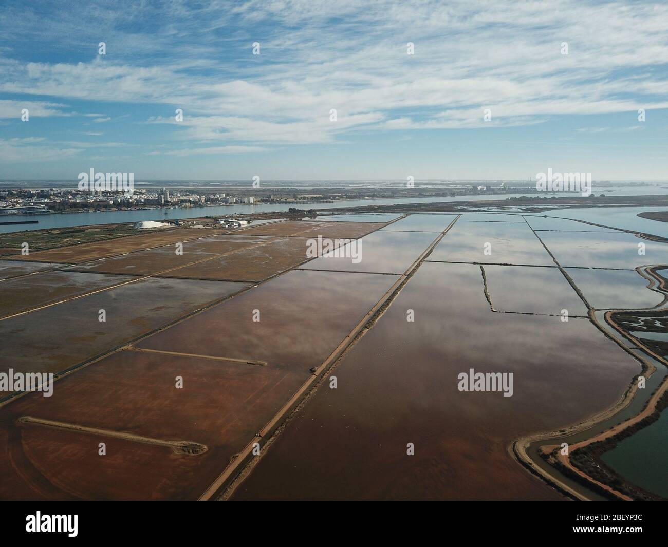 Beautiful aerial views of salt's farm production with a beautiful blue ...