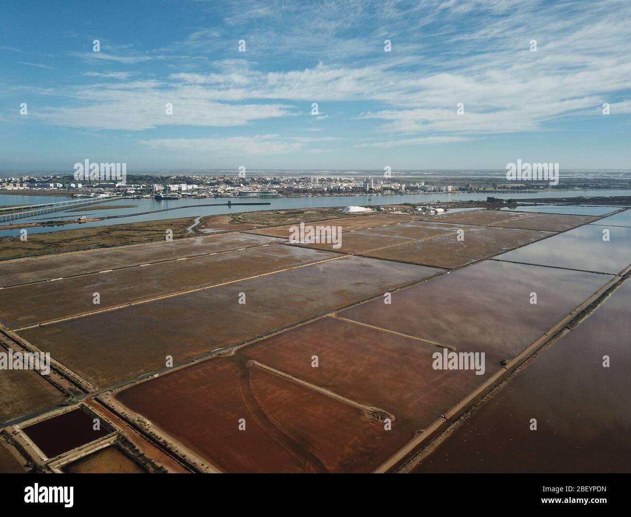 Beautiful aerial views of salt's farm production with a beautiful blue ...