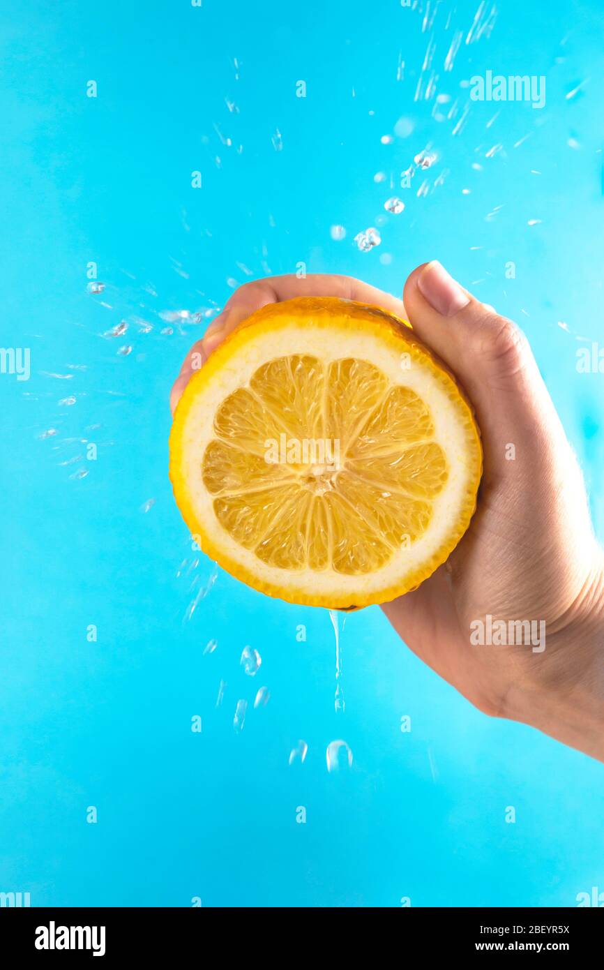 Lemons falling drops water hi-res stock photography and images - Alamy