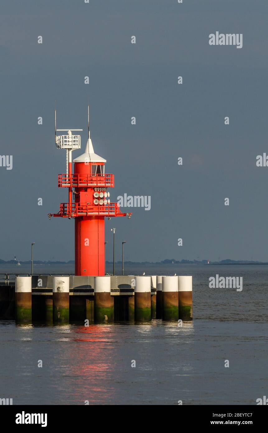 Red lighthouse at the Brunsbuettel lock, entrance to the Kiel Canal ...