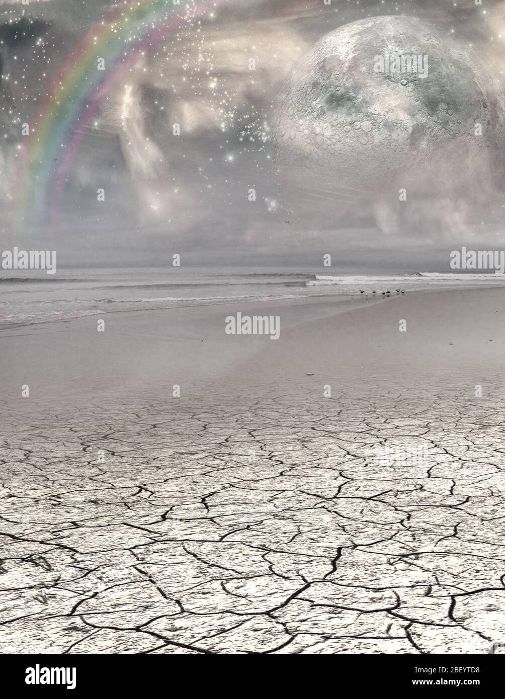 Surreal giant moon over ocean shore Stock Photo - Alamy