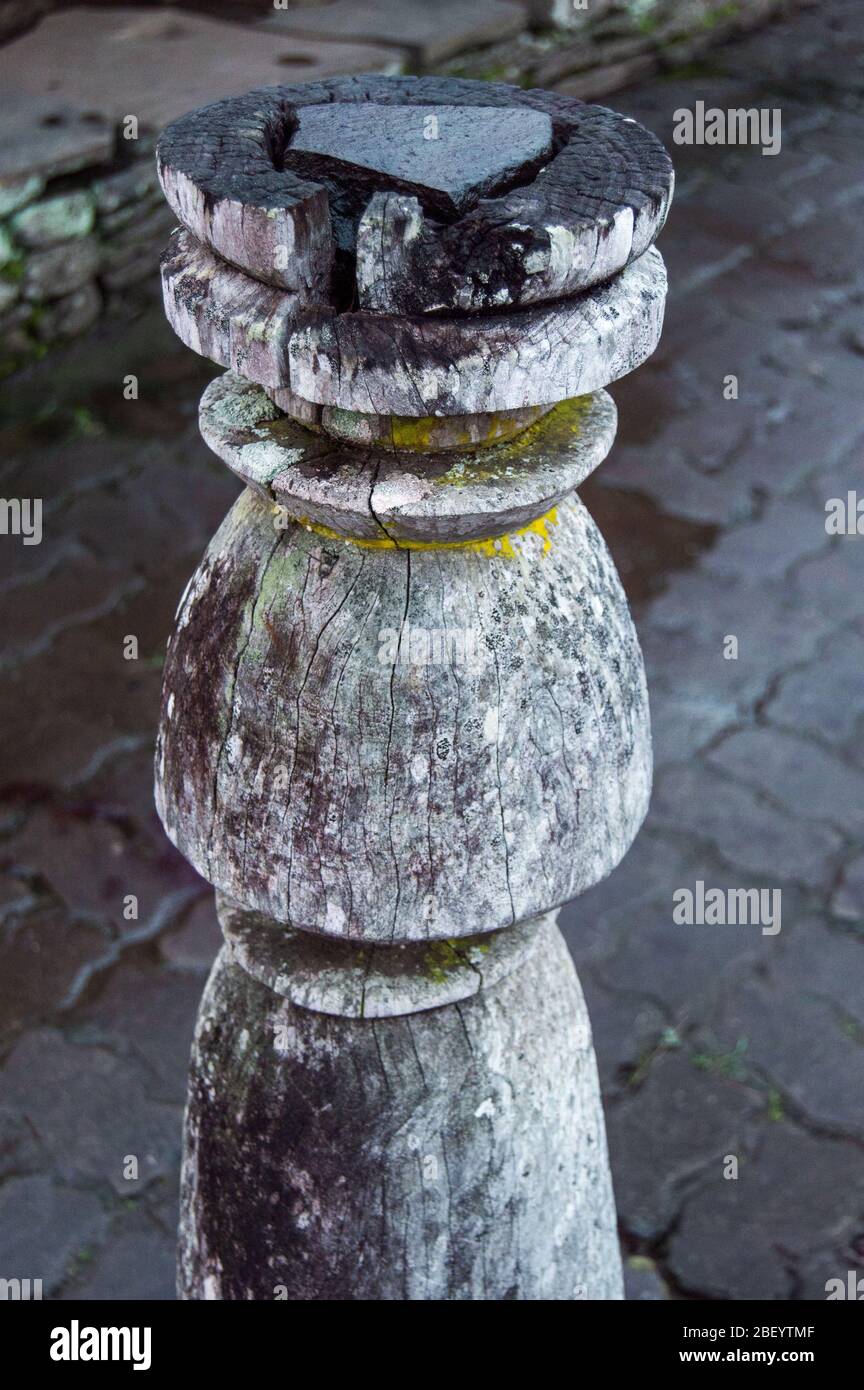 Old wooden decorated post, Indonesia Stock Photo - Alamy