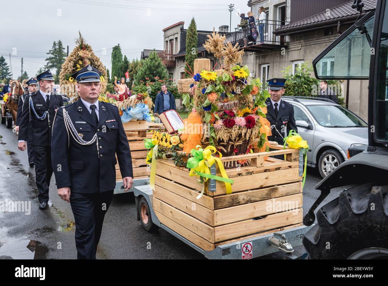 Traditional procession with straw wreath after mass during Dozynki ...