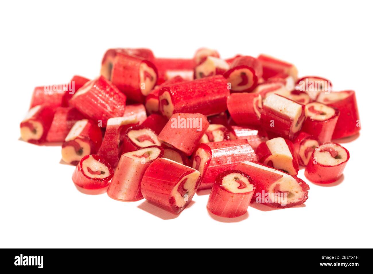 Big handful of red chilli lollipops with the image of pepper isolated ...