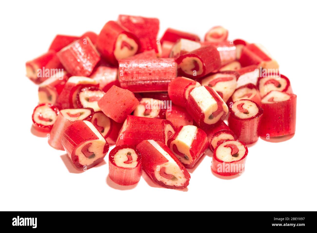 Big handful of red chilli lollipops with the image of pepper isolated ...