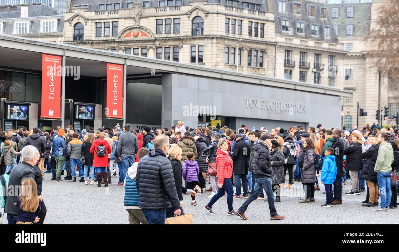Crowds of visitors and tourist queues for tickets at the Tower of ...