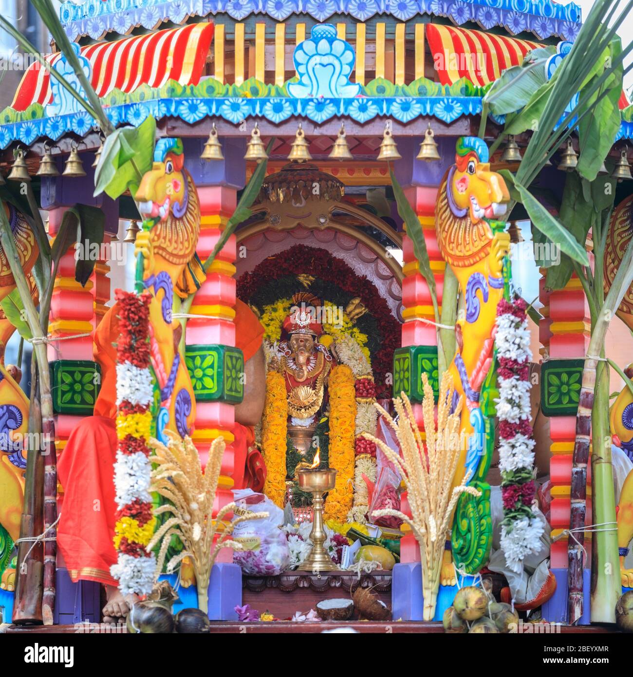 The main chariot, containing a representation of Hindu deities, is ...