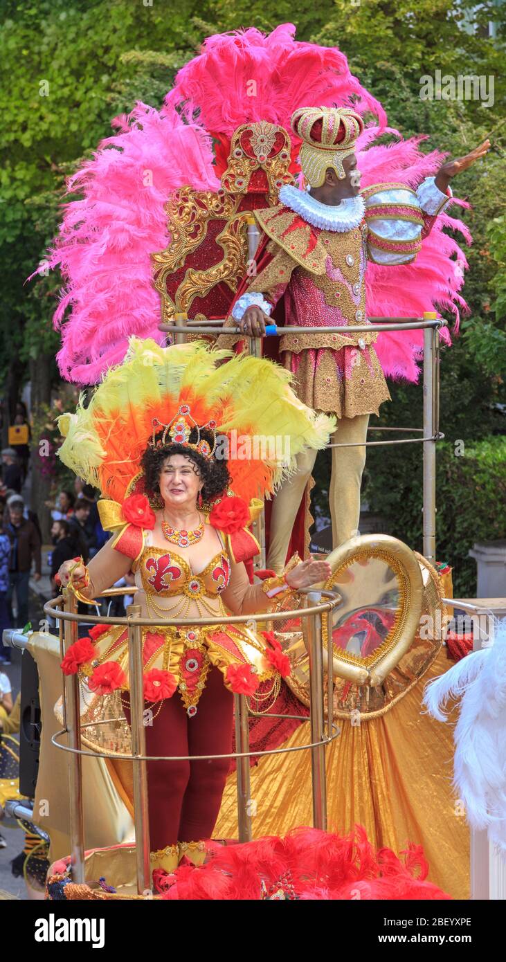 Colourful Caribbean float and participants in costume at Notting Hill ...