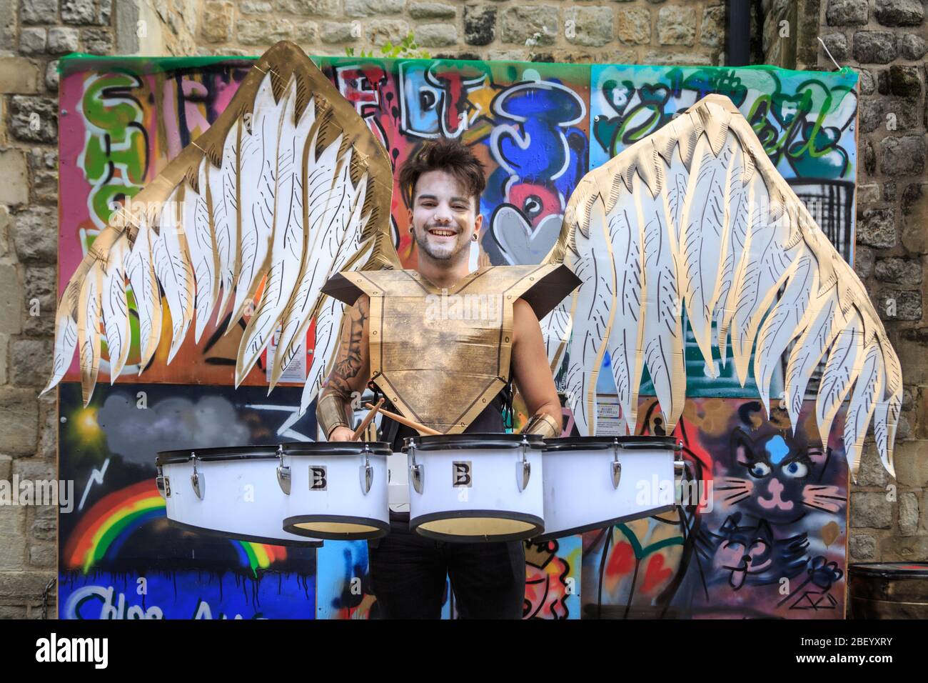 Steel drummer in Angel costume at Notting Hill carnival street festival ...