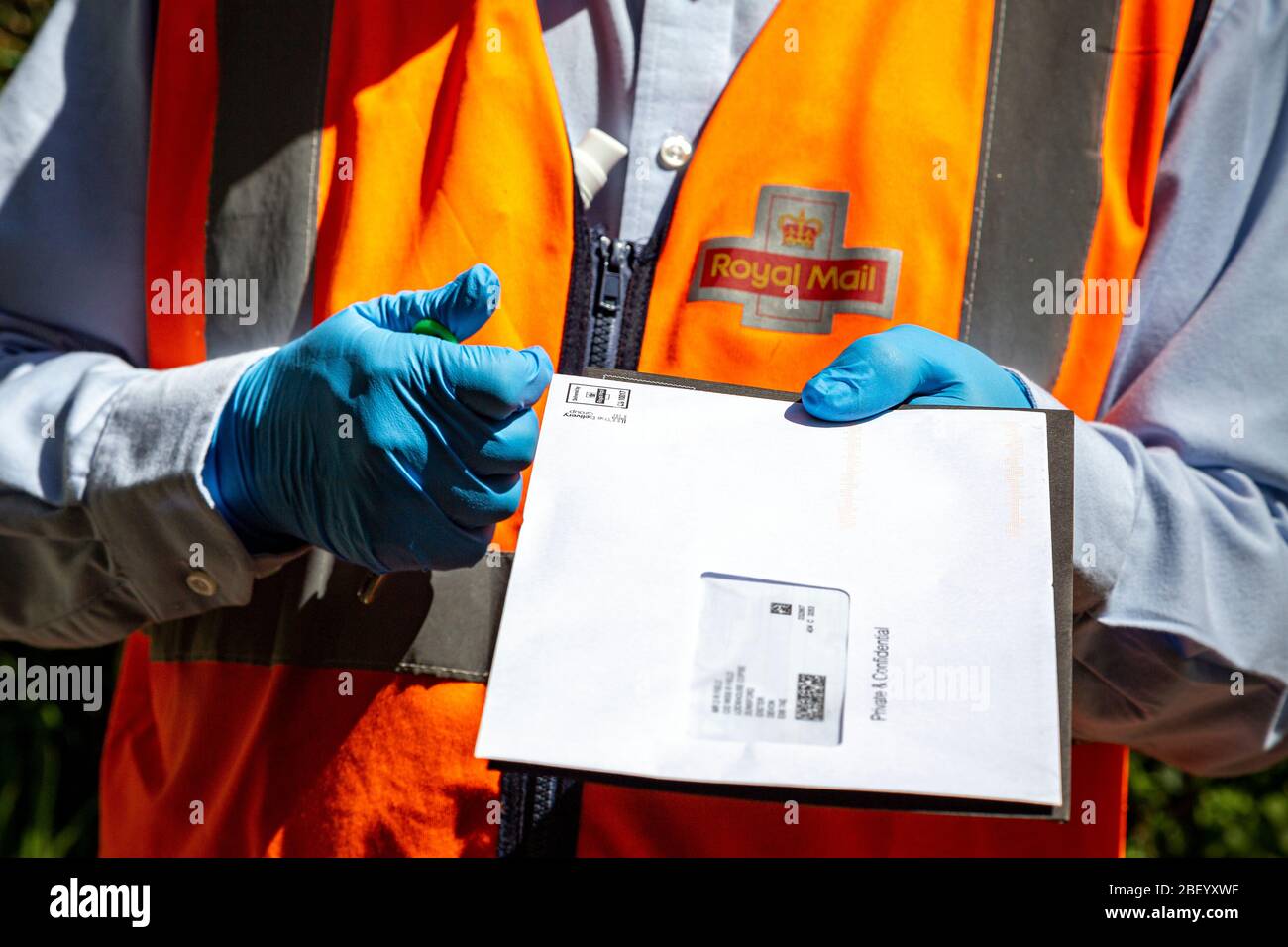 Postman Delivering Letter High Resolution Stock Photography and Images ...