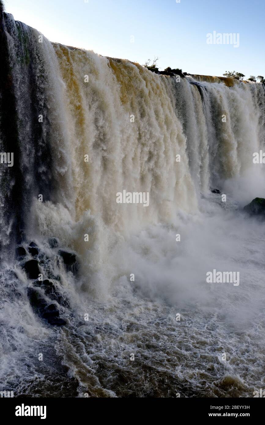 Close up of the water gushing over Devil's Throat waterfall at Iguacu ...