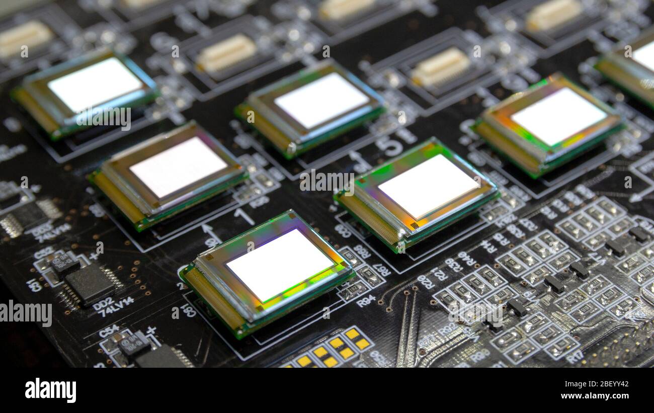 Several microdisplays bright of white color on the test station ...