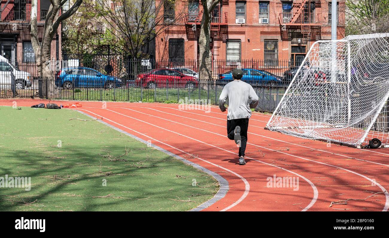 People exercise while keeping social distances at Thomas Jefferson Park ...