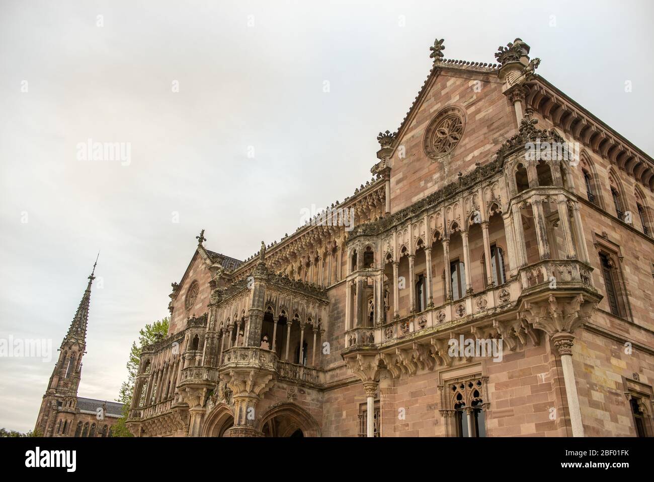 Palace of Sobrellano and church from Comillas, Santander, Spain Stock ...