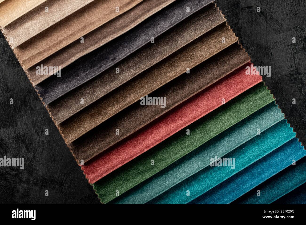 Dark color tailoring leather tissues in showroom Stock Photo - Alamy