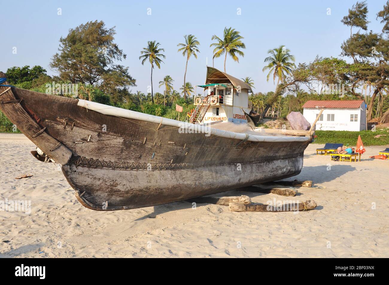 GOA, INDIA-MARCH 05,2013: old fishing boat on the beach in Goa, close ...