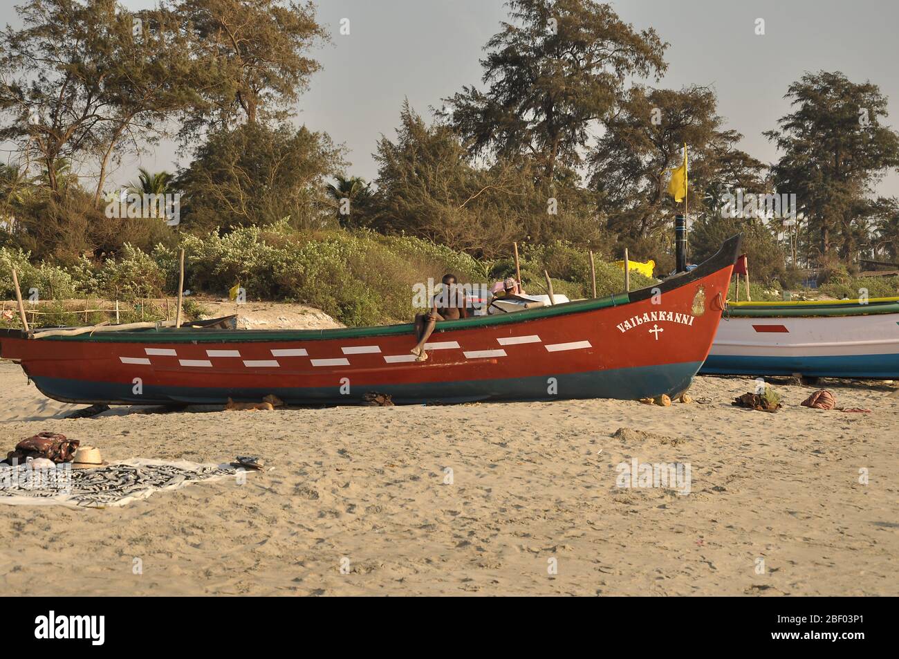 GOA, INDIA-MARCH 05,2013: old fishing boat on the beach in Goa, close ...