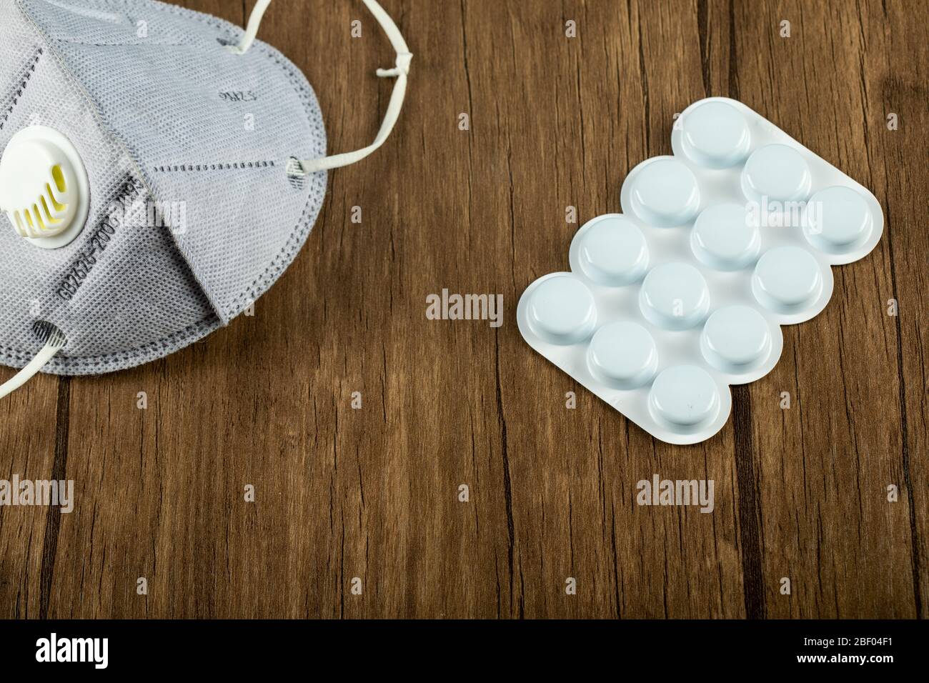 Medical face mask, virus preventer with medical drugs Stock Photo - Alamy