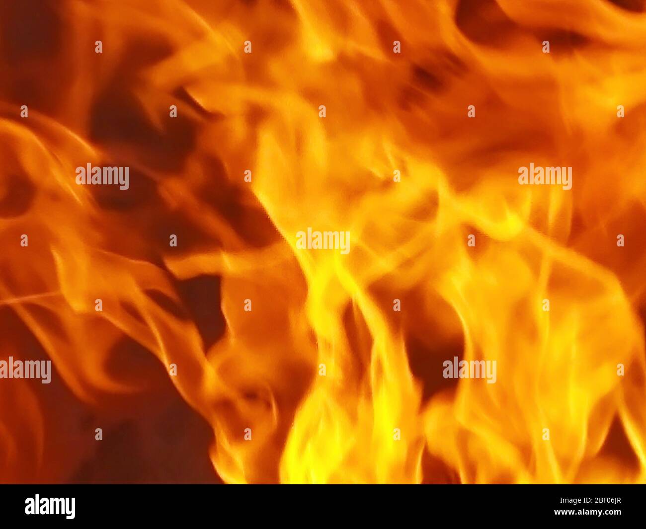 Blurred background of burning fire flame.Natural fire red and orange ...