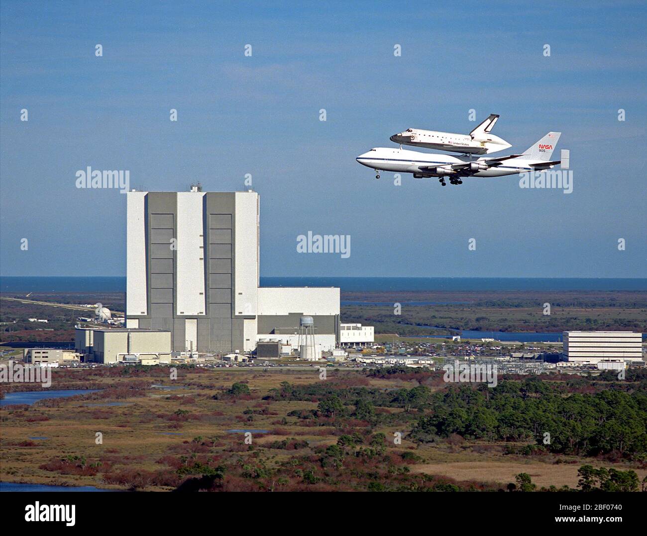 The Space Shuttle Columbia, returning to KSC after the successful STS ...