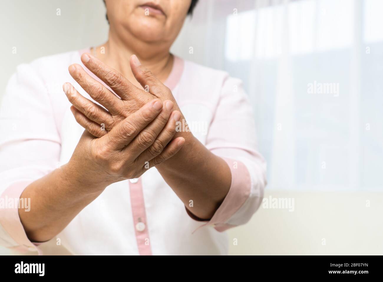 wrist hand pain of old woman, healthcare problem of senior concept ...