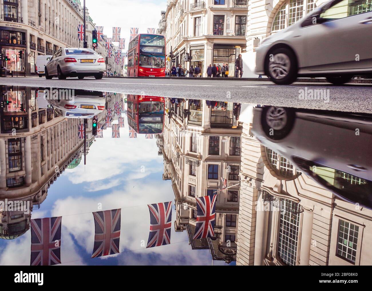 LONDON- Abstract view of London's Regent Street reflected in surface ...