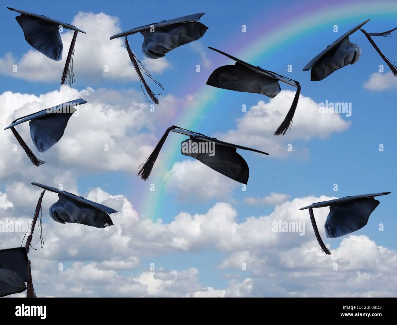 black graduation caps in sky with rainbow Stock Photo - Alamy