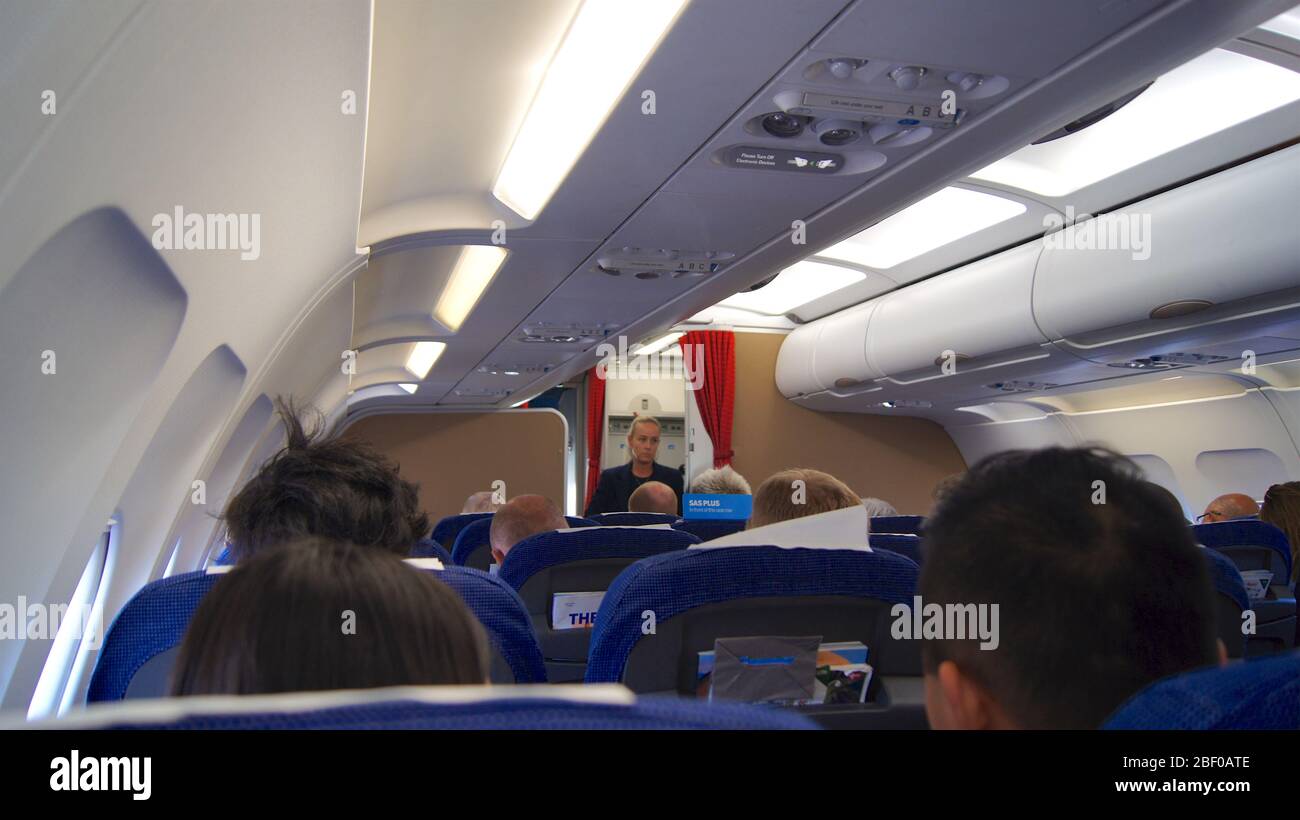 COPENHAGEN, DENMARK - JUL 06th, 2015: SAS aircraft cabin interior with ...