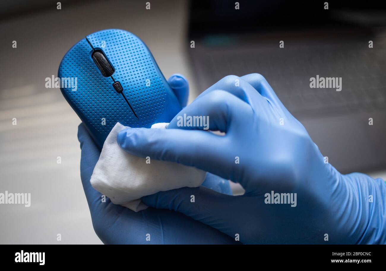 Office sanitizing wipe wiping mouse and mousepad with disinfecting ...