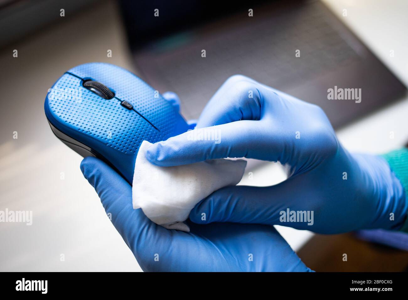Office sanitizing wipe wiping mouse and mousepad with disinfecting ...