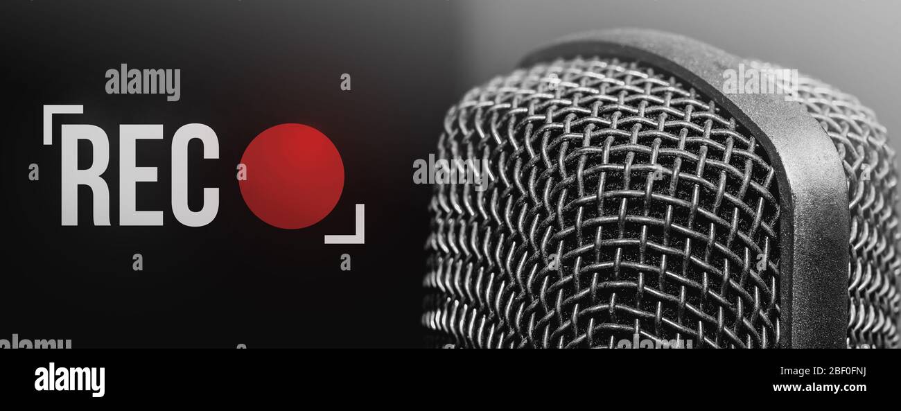 Music studio background with a professional microphone and a rec sign ...