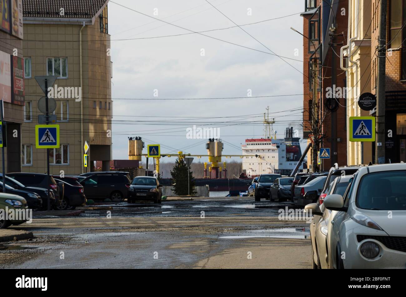 Arkhangelsk. City street. Cargo ship in the alignment of the street ...