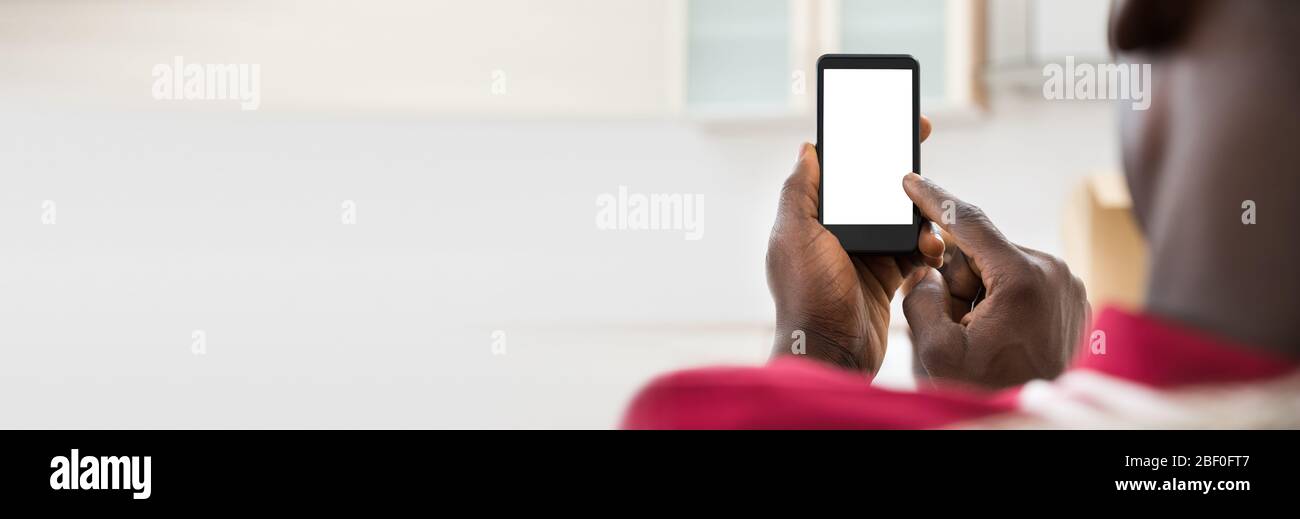 Black person hand mobile phone hi-res stock photography and images - Alamy