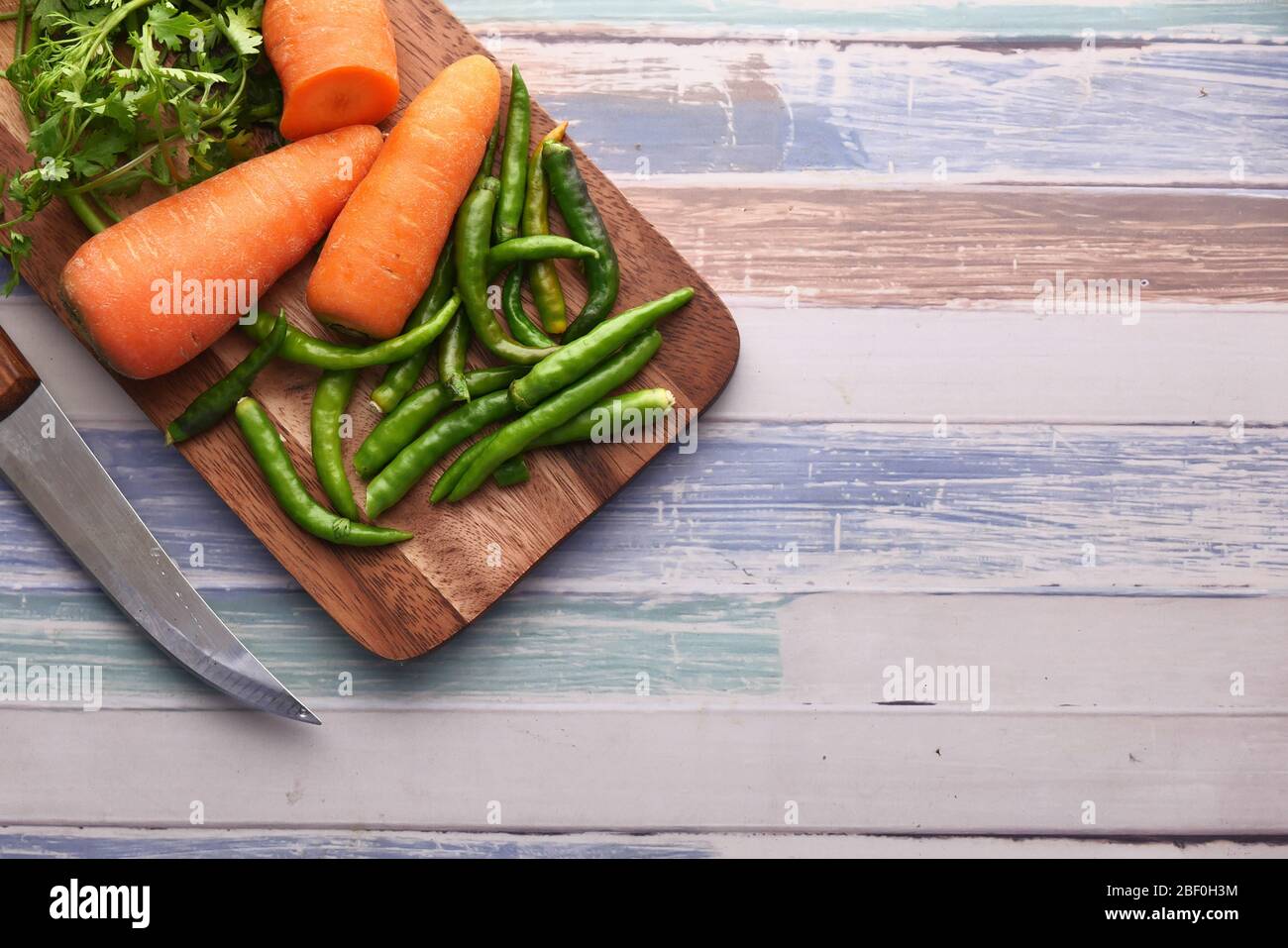 fresh vegetable on chopping board with copy space Stock Photo - Alamy