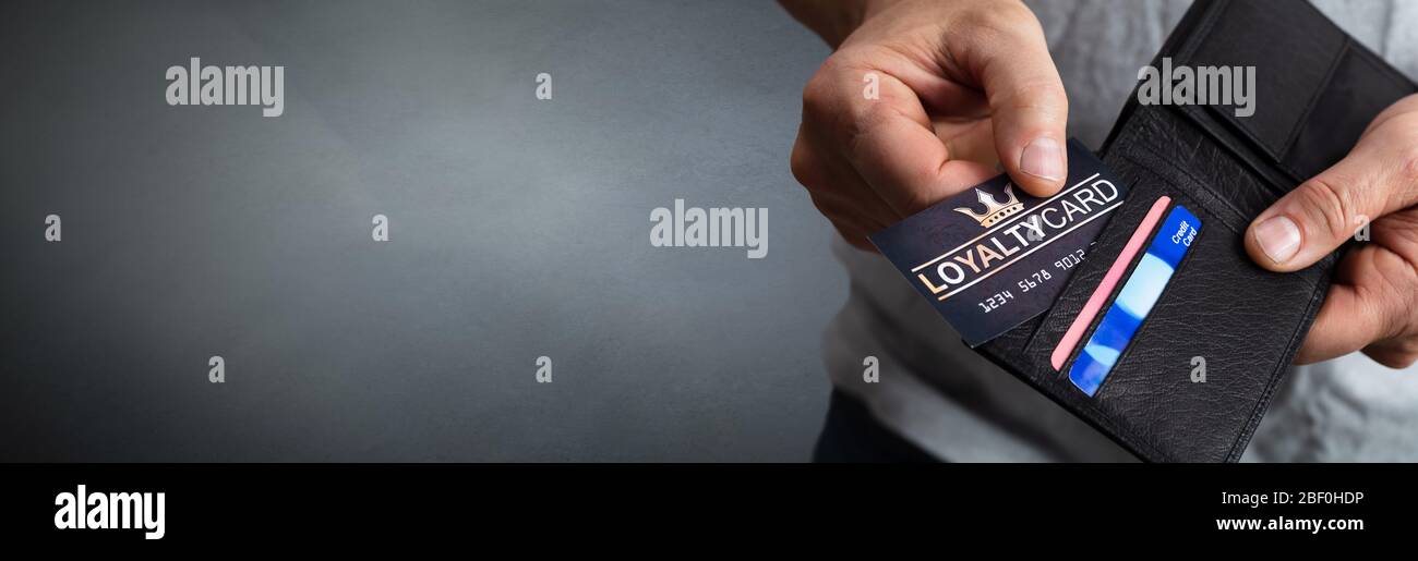 Loyalty Reward Program Card In Person Wallet Stock Photo - Alamy