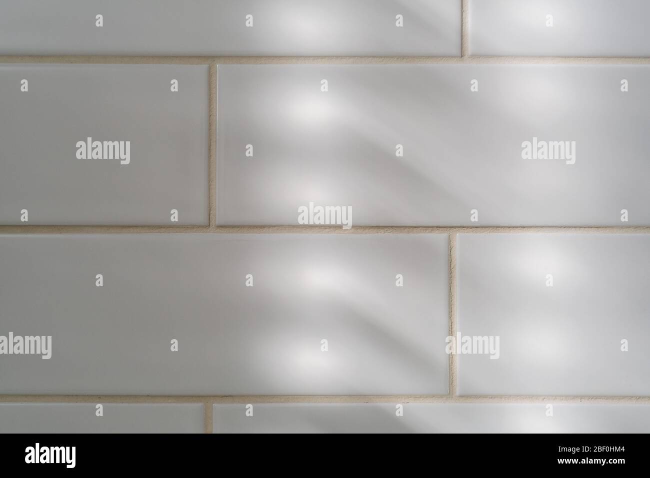 White tiles and reflection Stock Photo - Alamy