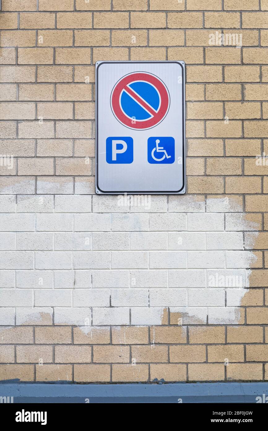 Disabled Only Parking Traffic Sign at Wall Stock Photo - Alamy