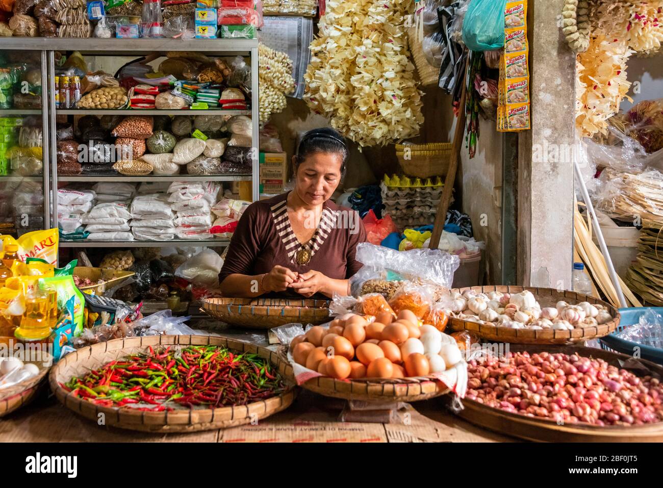 Horizontal view of a grocery stall at Pejeng Market in Bali, Indonesia ...