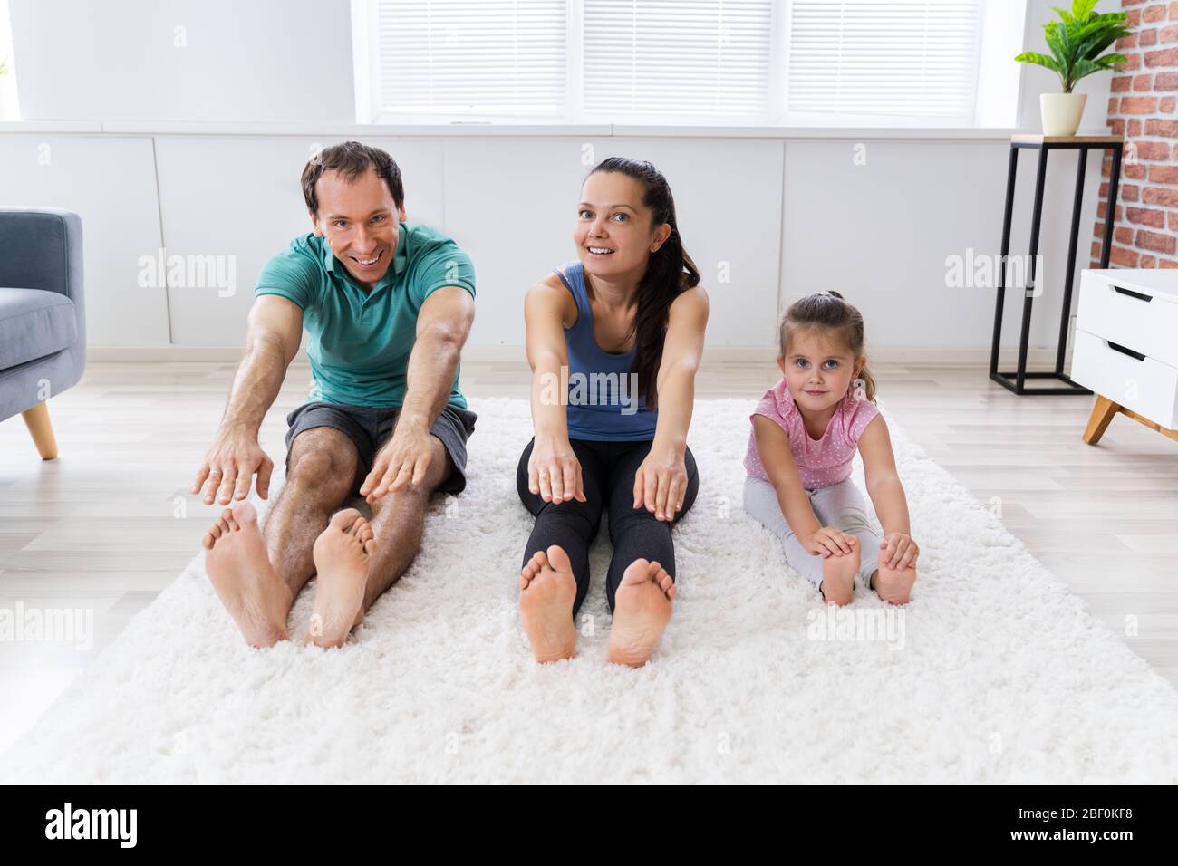 Family exercise hi-res stock photography and images - Alamy