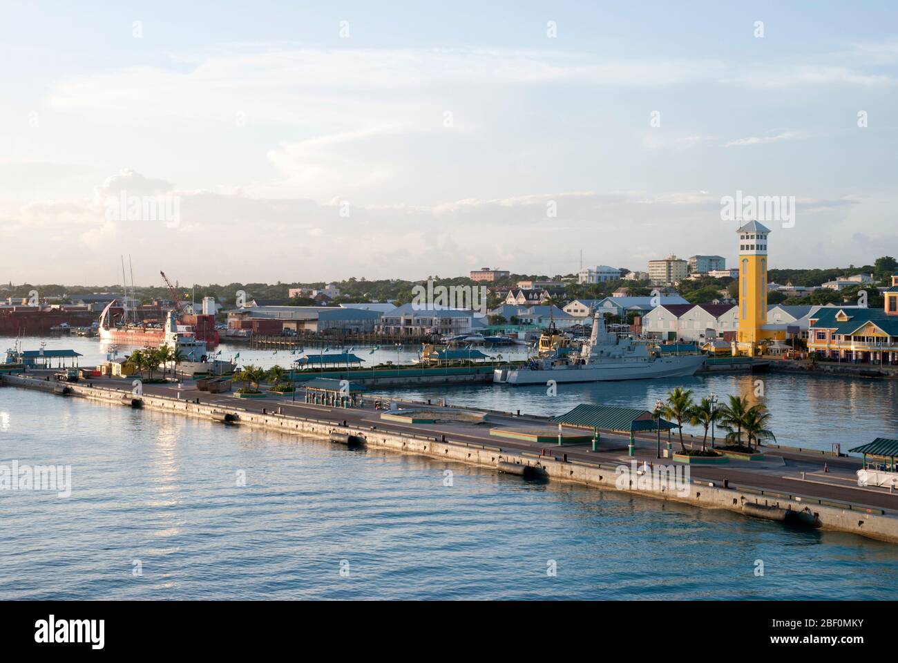 The early morning view of Nassau city port and a moored navy ship ...