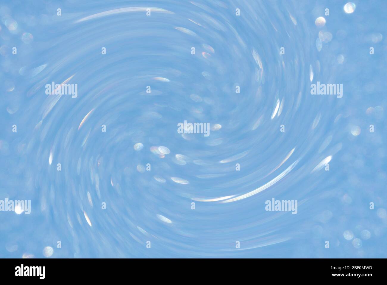 blurred blue energy vortex flow background with abstract snow. For ...