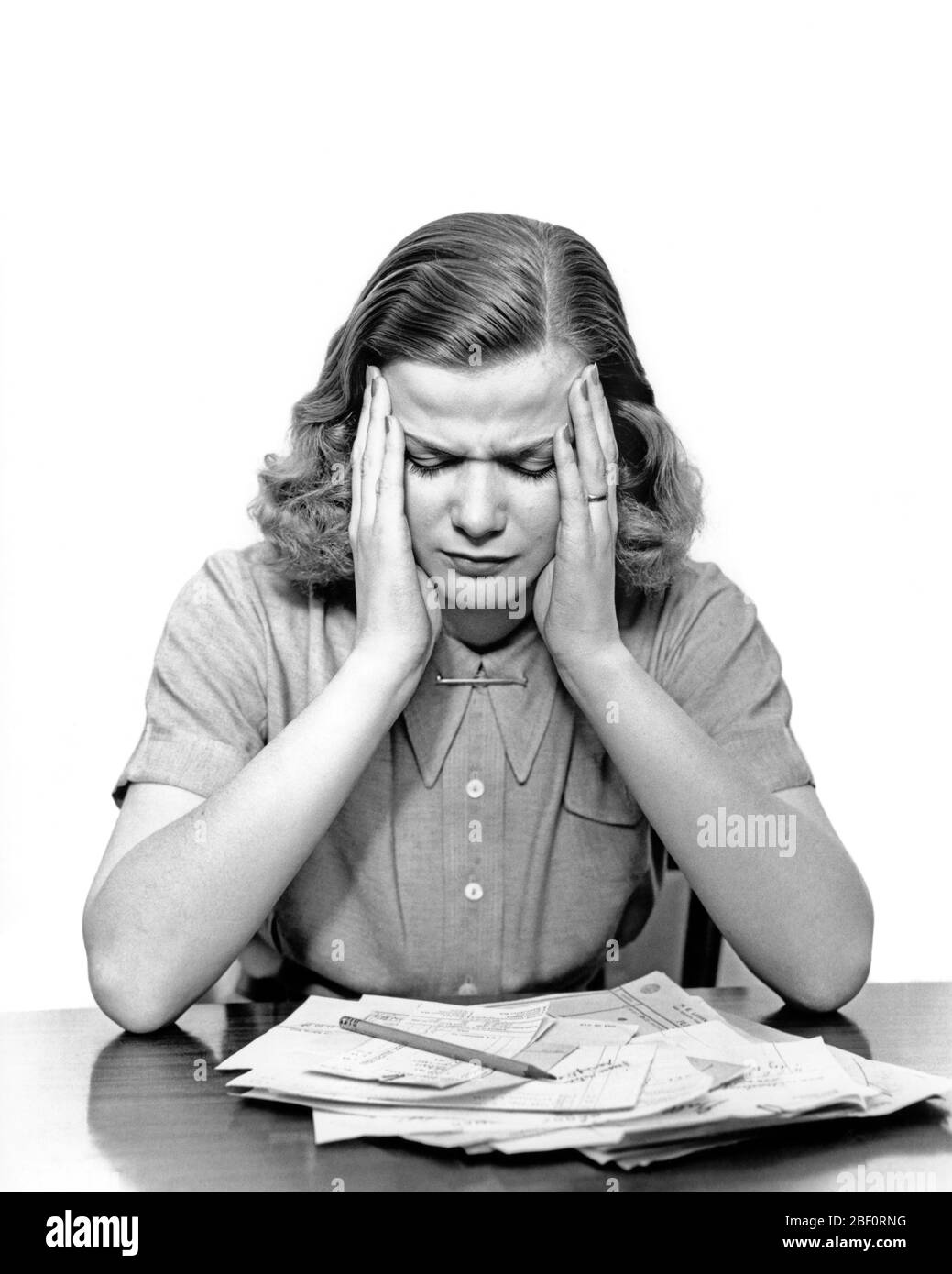 Worried nervous woman studio shot Black and White Stock Photos & Images ...