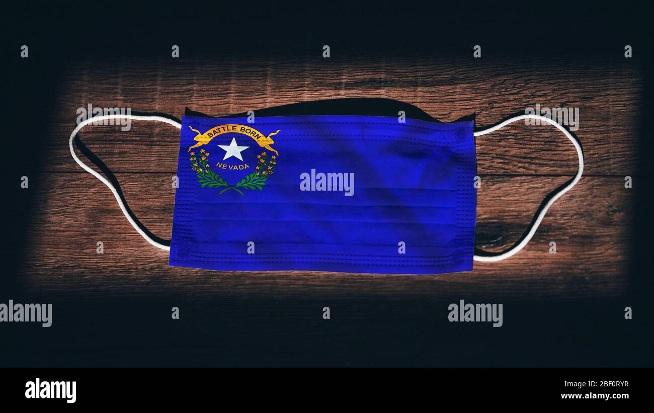 Nevada Flag. Coronavirus Covid 19 in U.S. State. Medical mask isolate ...