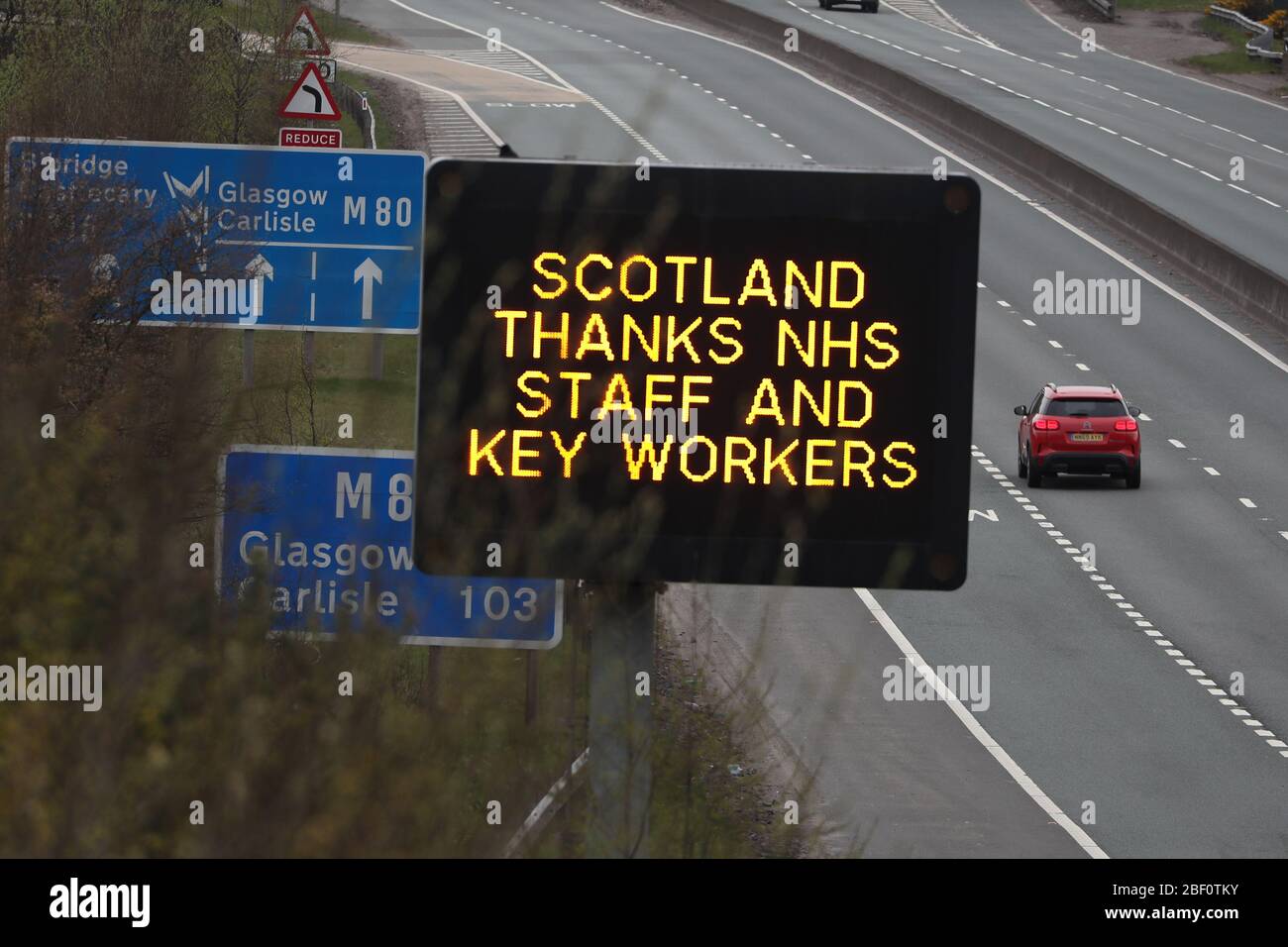A road sign thanking NHS staff and key workers on the M80 near Banknock ...