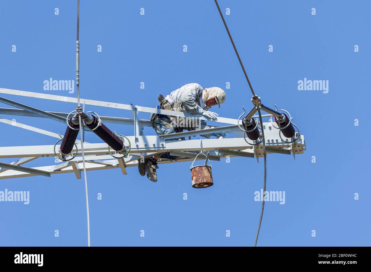 Painter on high voltage pylon, Baden-Wuertemberg, Germany Stock Photo ...