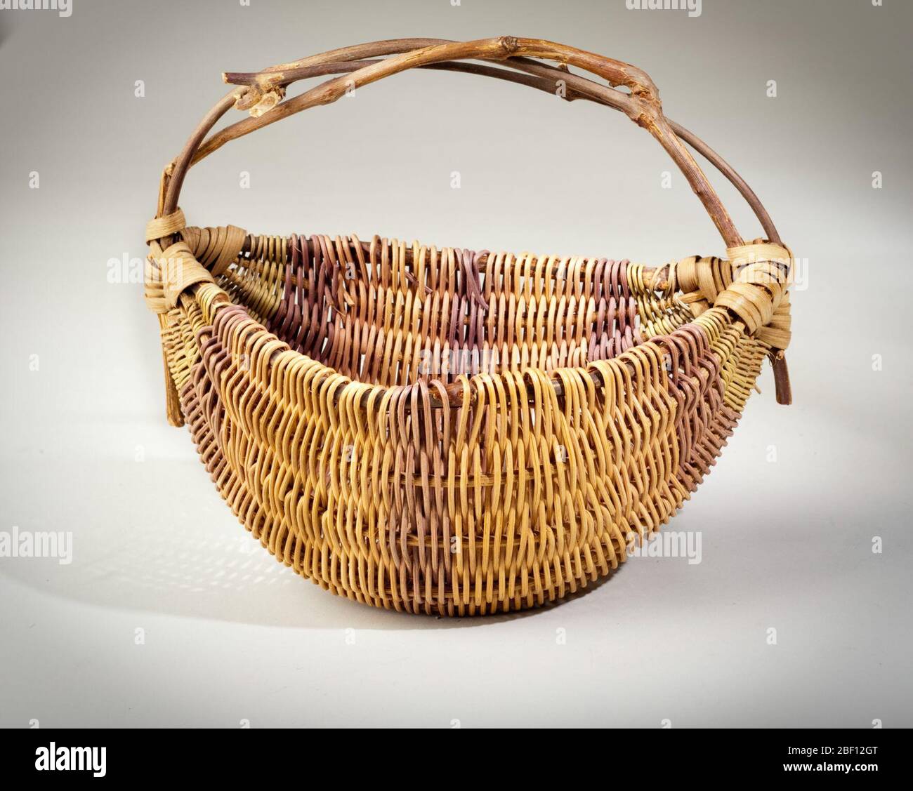 Handmade Basket with Handle and Vertical Stripes Stock Photo - Alamy