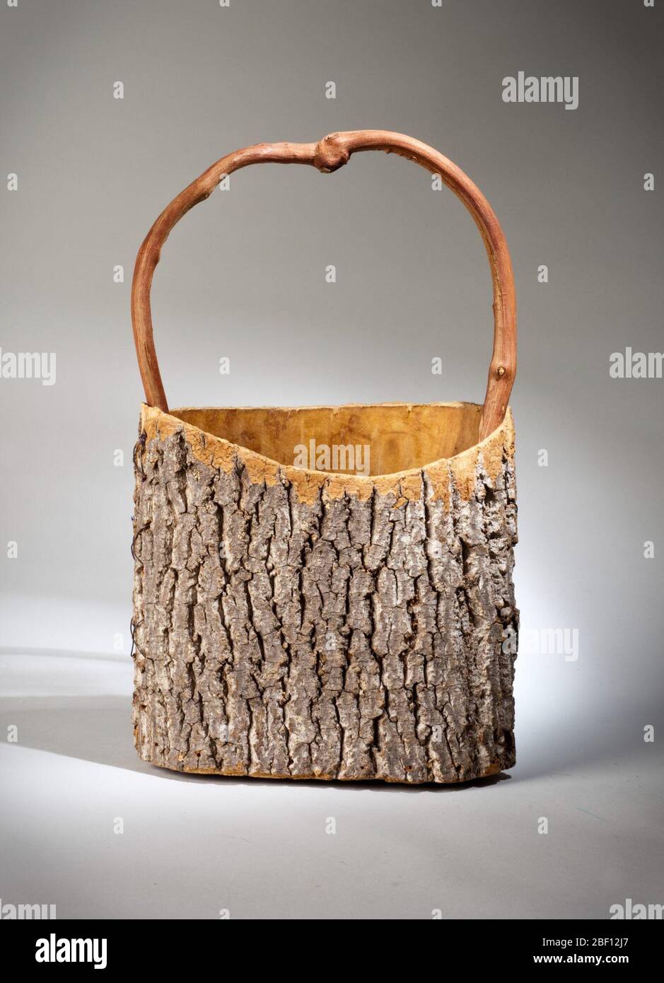 Handmade Tree Bark Basket with Twig Handle Stock Photo - Alamy